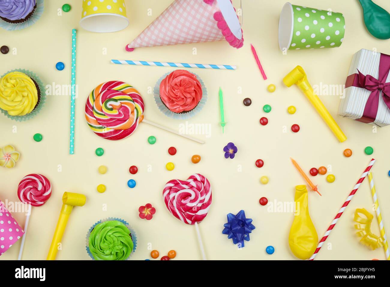 Bright birthday background with sweets and decorations Stock Photo - Alamy