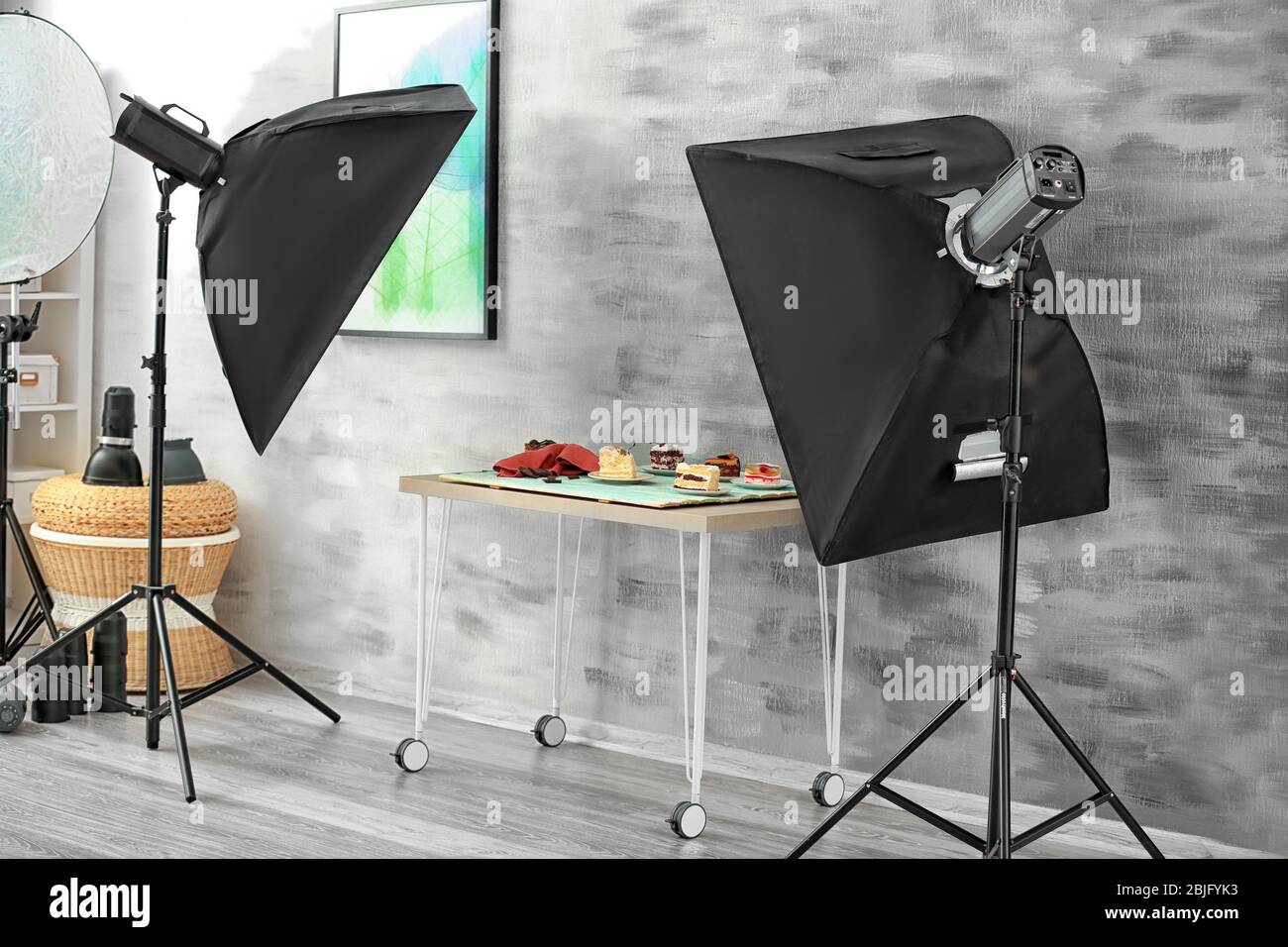 Photo studio with professional lighting equipment while shooting food ...