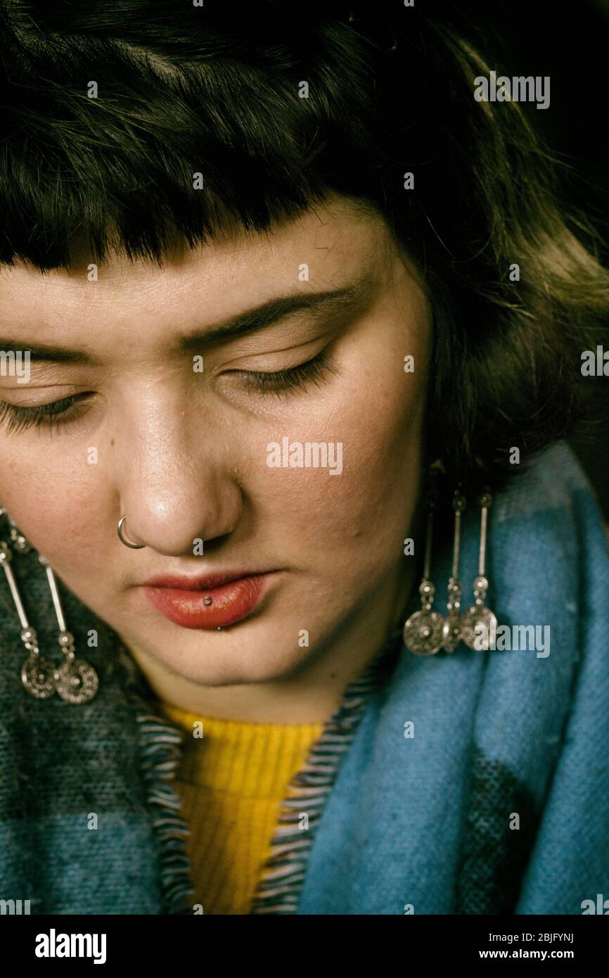 Warm close up features of a young woman Stock Photo - Alamy