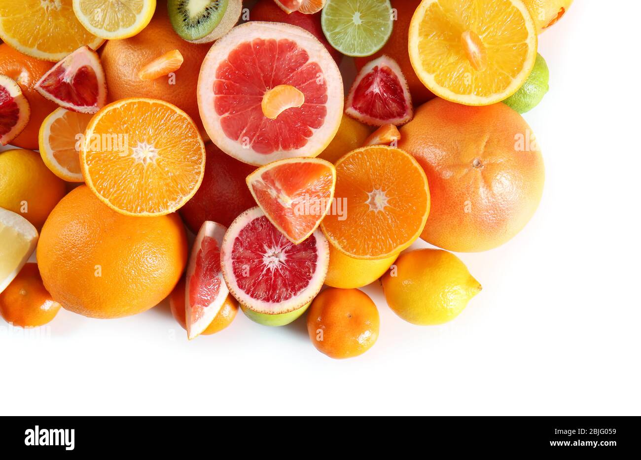 Fresh juicy citrus fruits on white background Stock Photo - Alamy