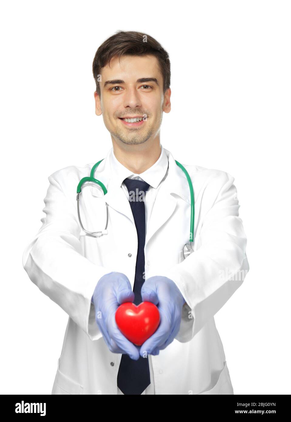 Handsome young cardiologist on white background Stock Photo - Alamy