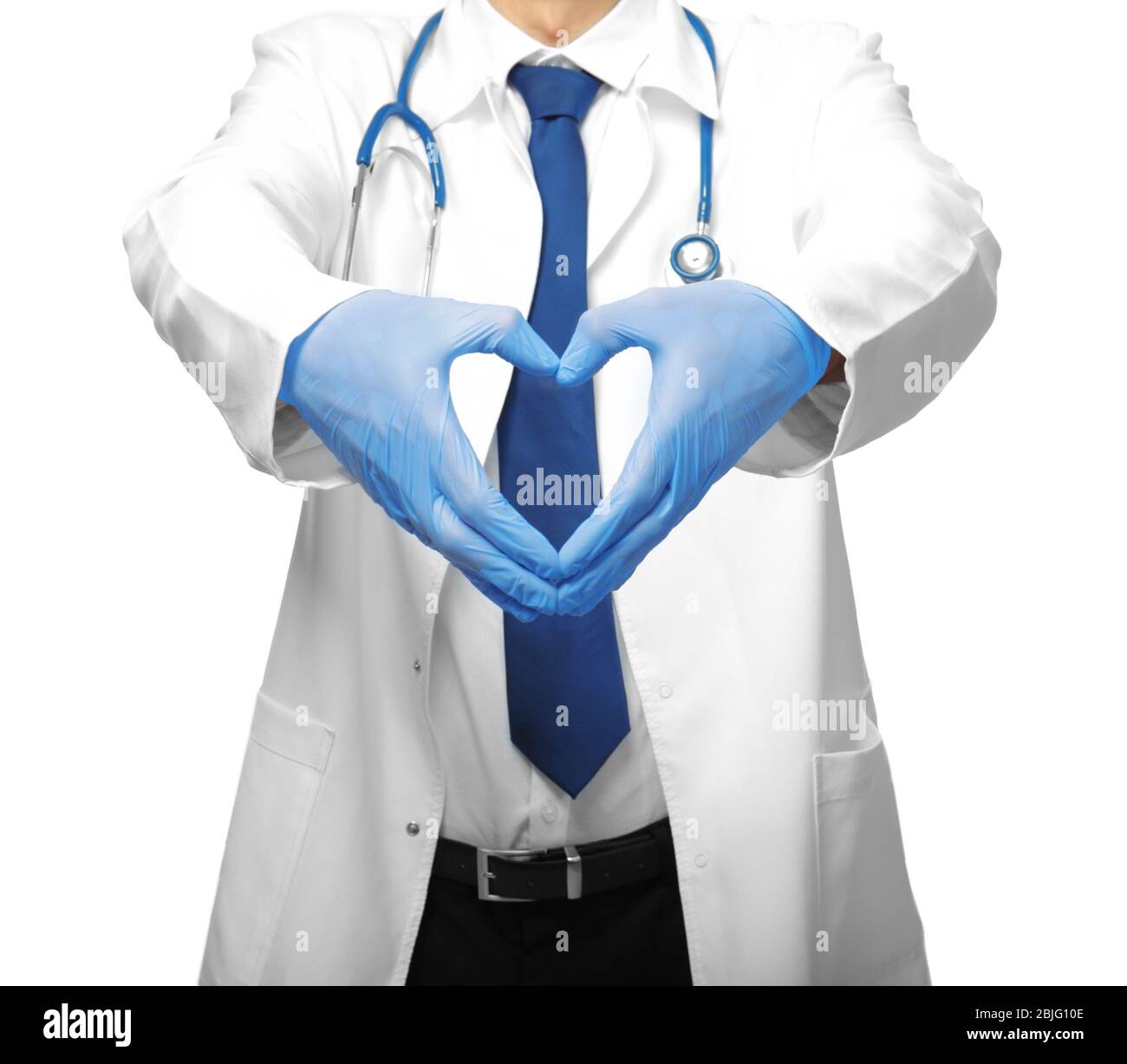 Doctor making heart with his hands on white background Stock Photo - Alamy