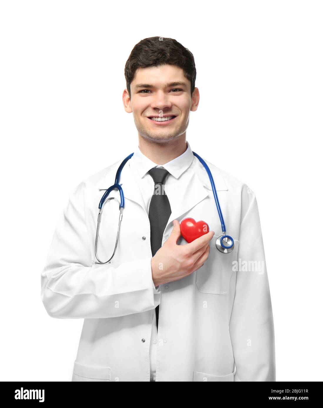 Handsome young cardiologist on white background Stock Photo - Alamy