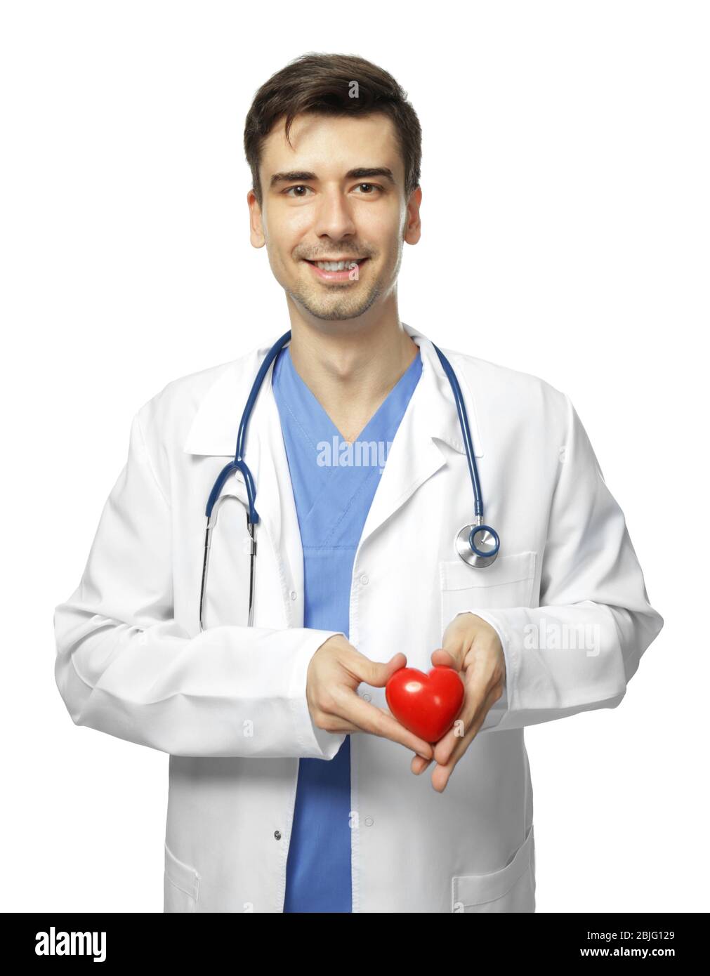 Handsome young cardiologist on white background Stock Photo - Alamy