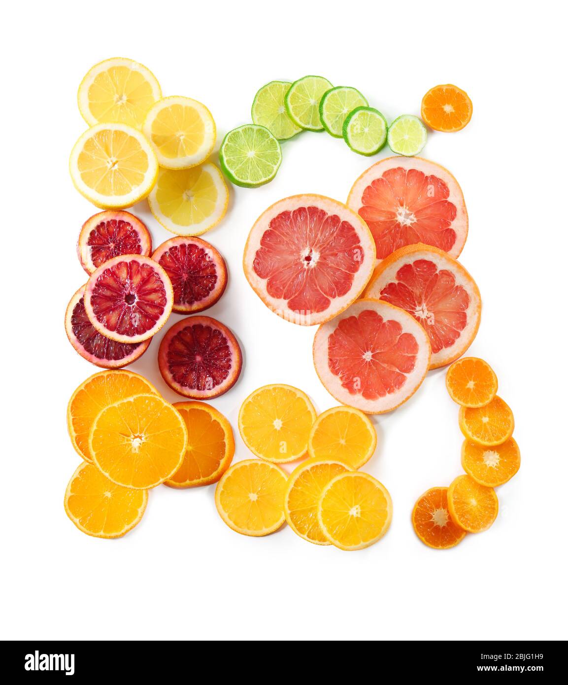 Slices of citrus fruits on white background Stock Photo - Alamy