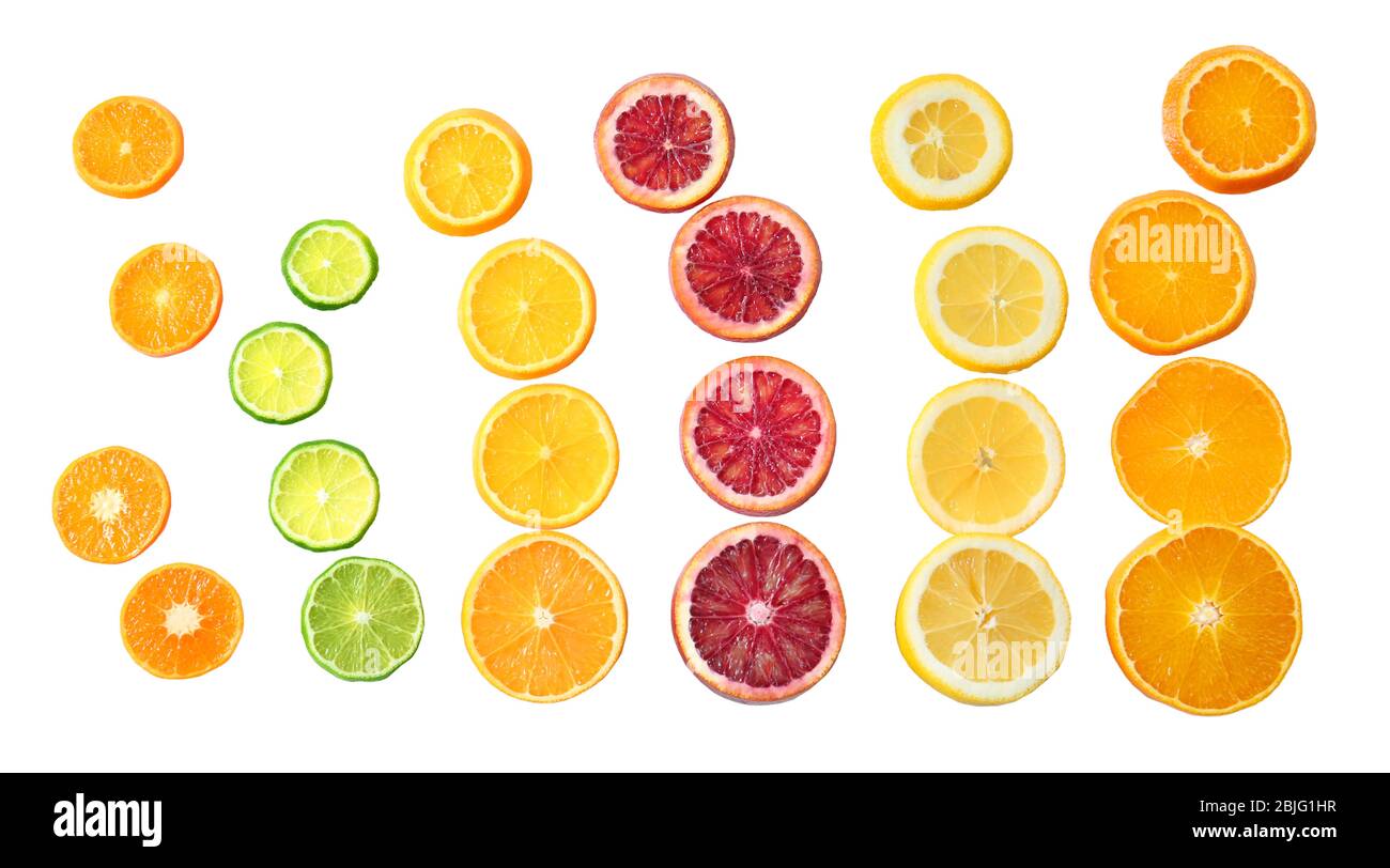 Slices of citrus fruits on white background Stock Photo - Alamy