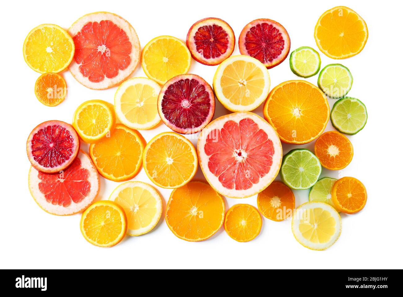 Slices of citrus fruits on white background Stock Photo - Alamy