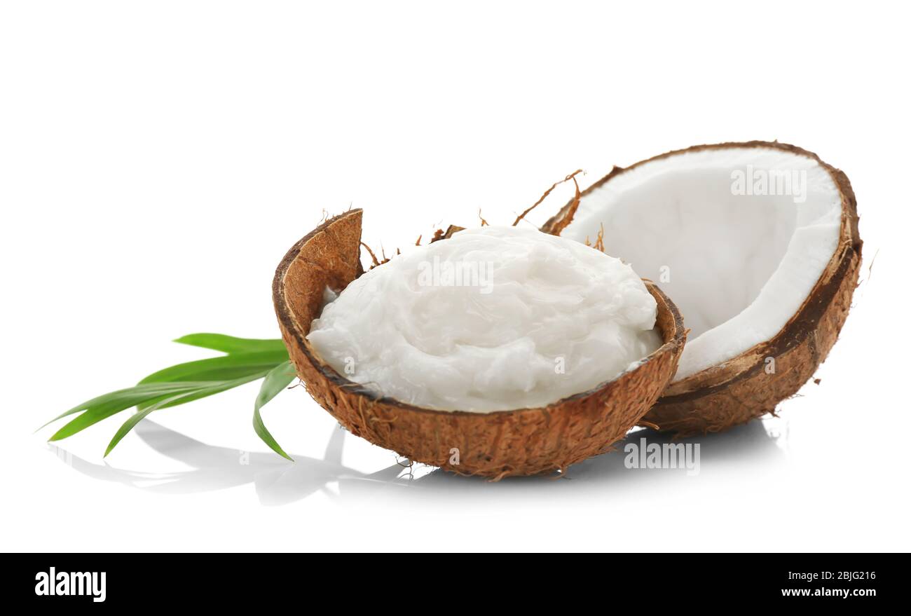 Composition with coconut oil in shell on white background Stock Photo ...