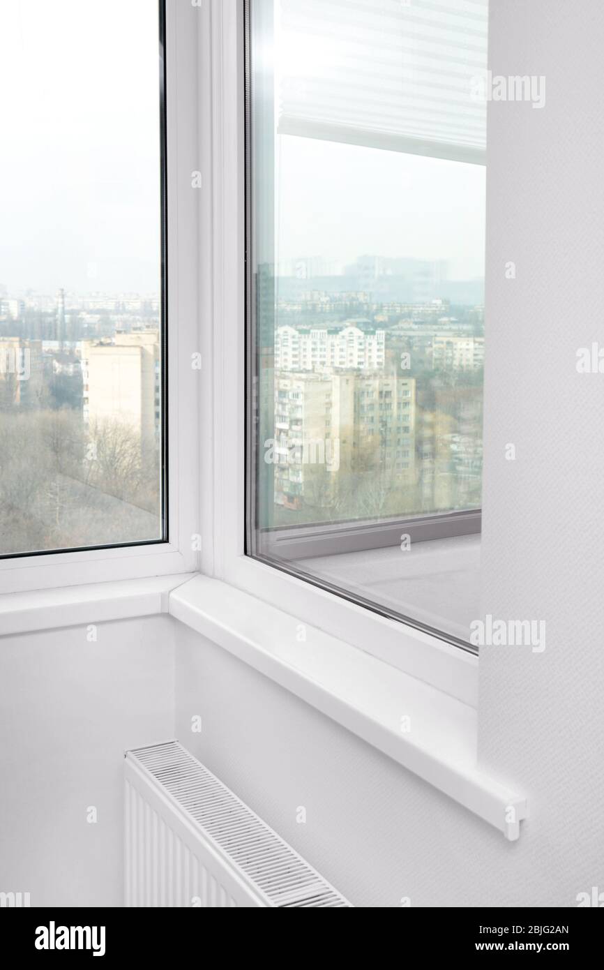 Modern white plastic window at home Stock Photo - Alamy