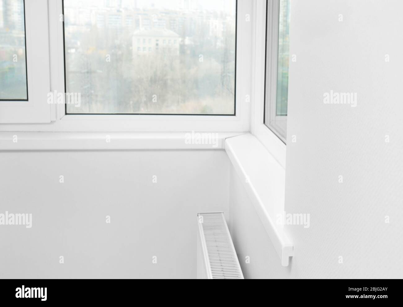 Modern white plastic window at home Stock Photo - Alamy