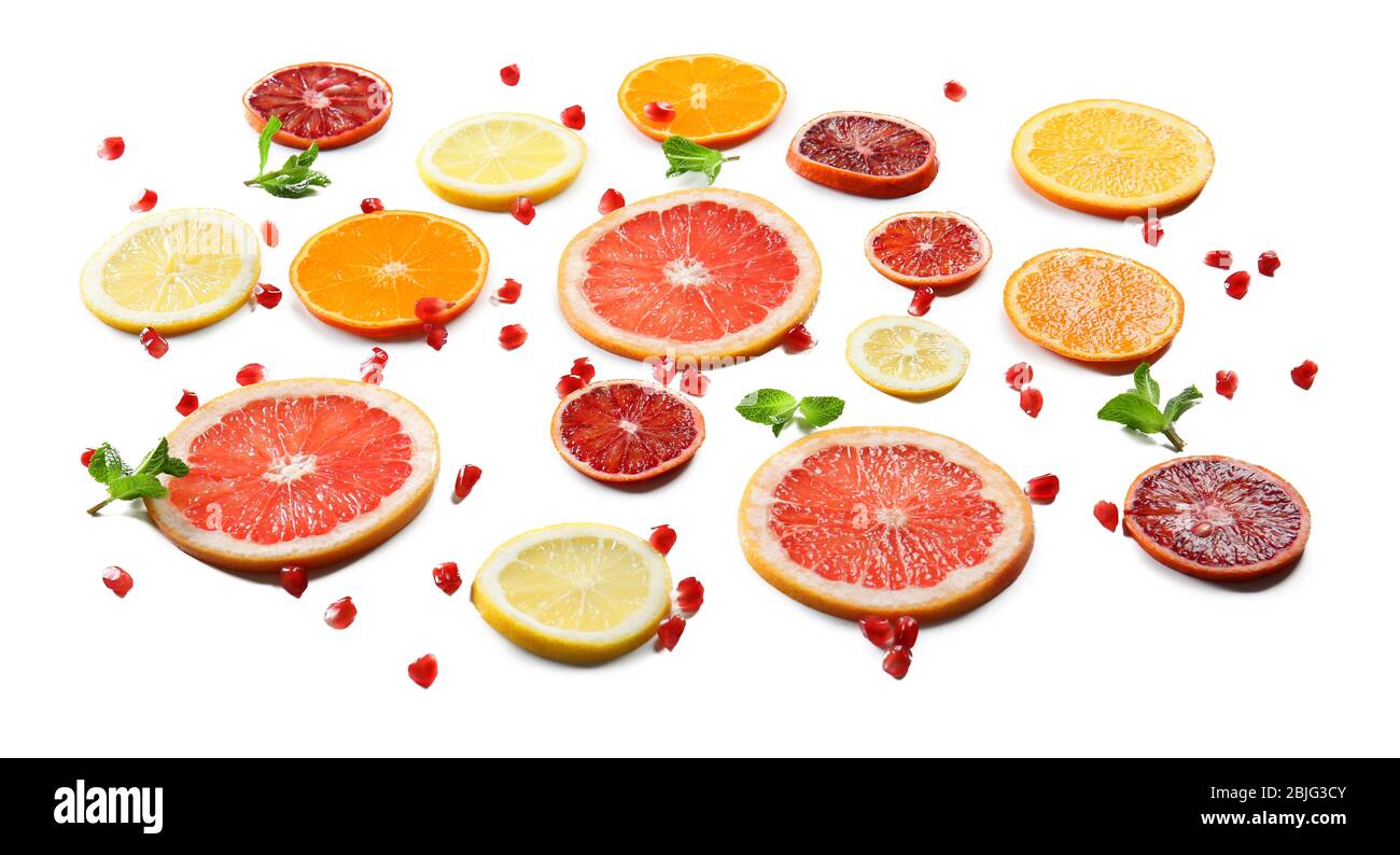 Citrus slices on white background Stock Photo - Alamy