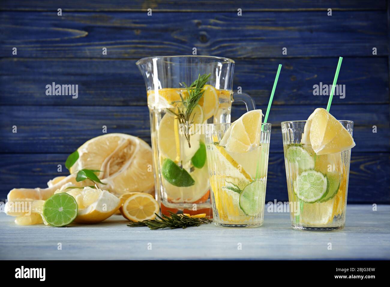 Fresh lemonade and fruits on table Stock Photo - Alamy