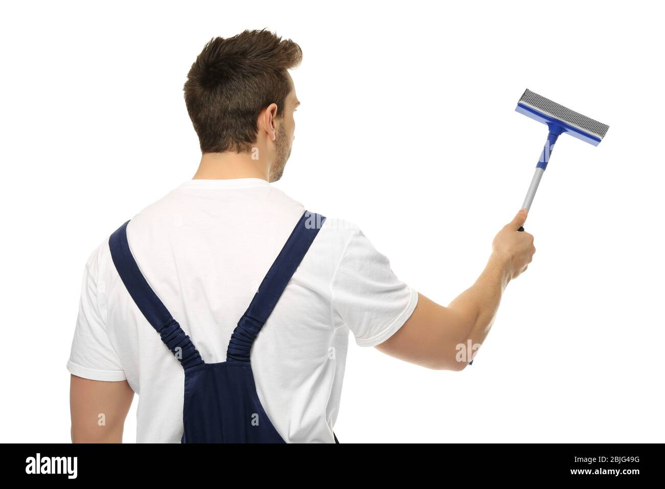 Young window cleaner on white background Stock Photo - Alamy
