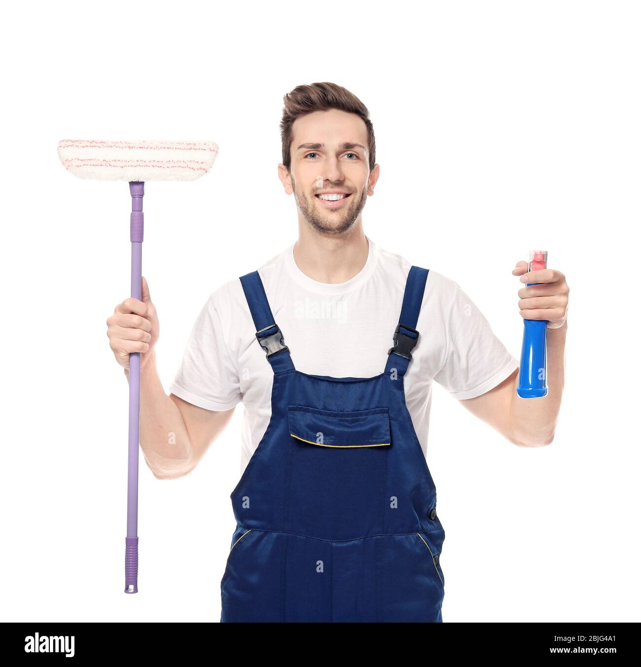 Young window cleaner on white background Stock Photo - Alamy
