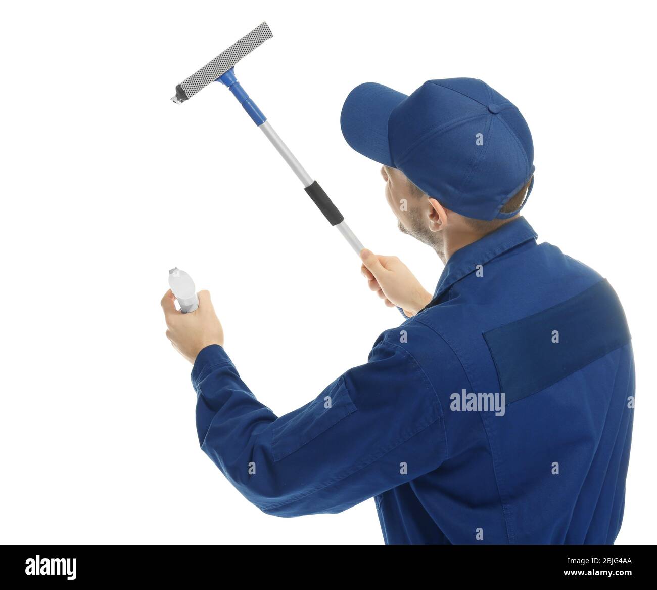 Young window cleaner on white background Stock Photo - Alamy