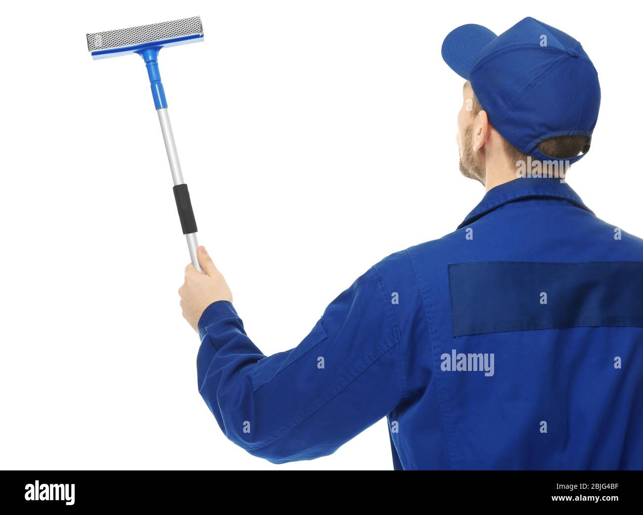 Young window cleaner on white background Stock Photo - Alamy