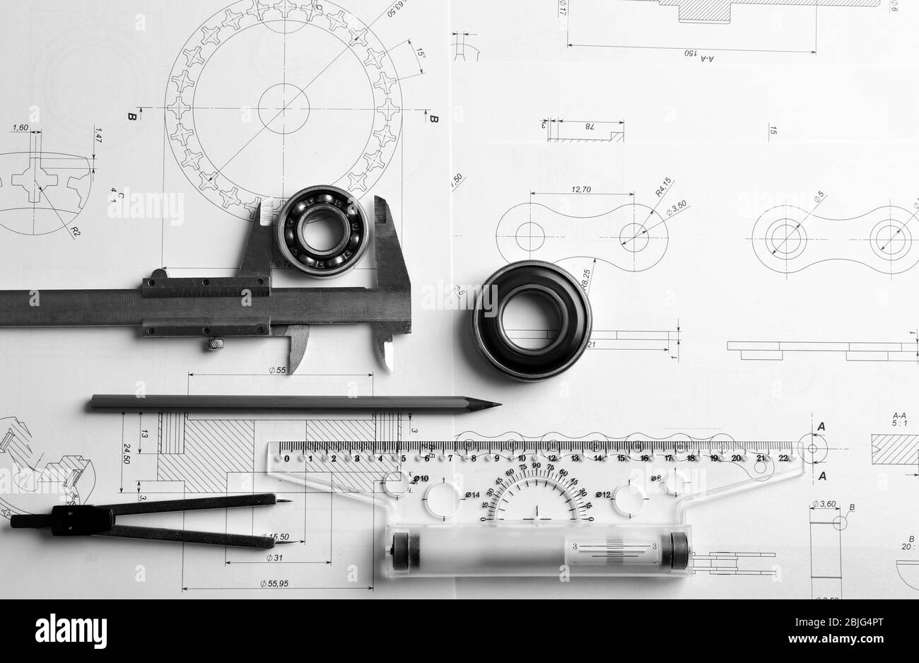 Engineering supplies and blueprints on workplace Stock Photo - Alamy