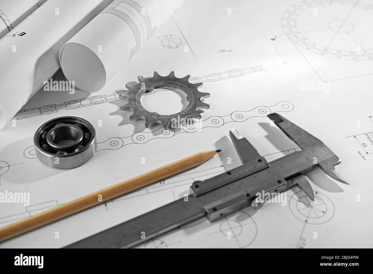 Engineering supplies and blueprints on workplace Stock Photo - Alamy