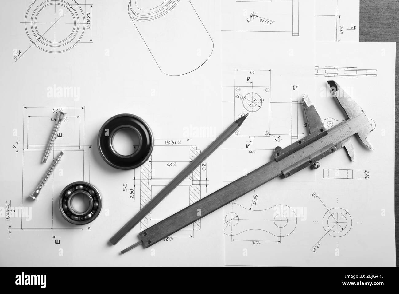 Engineering supplies and blueprints on workplace Stock Photo - Alamy
