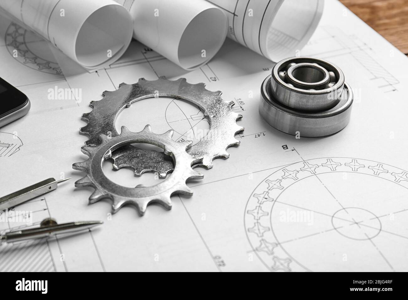 Engineering supplies and blueprints on workplace Stock Photo - Alamy