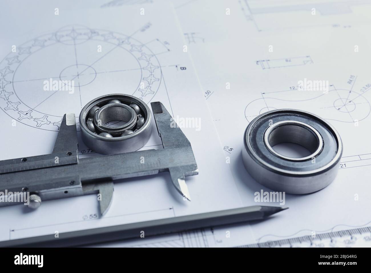 Engineering supplies and blueprints on workplace Stock Photo - Alamy