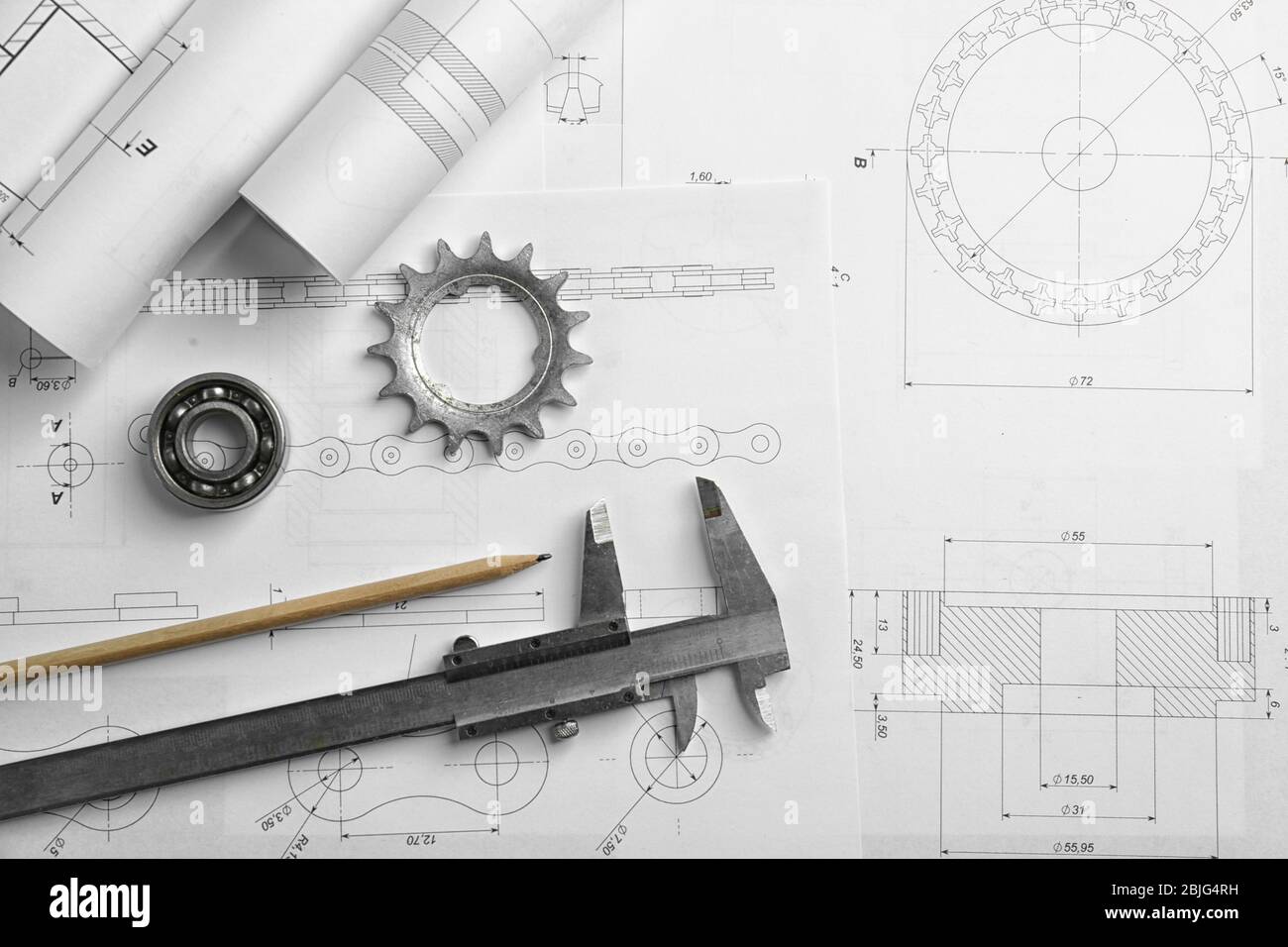 Engineering supplies and blueprints on workplace Stock Photo - Alamy