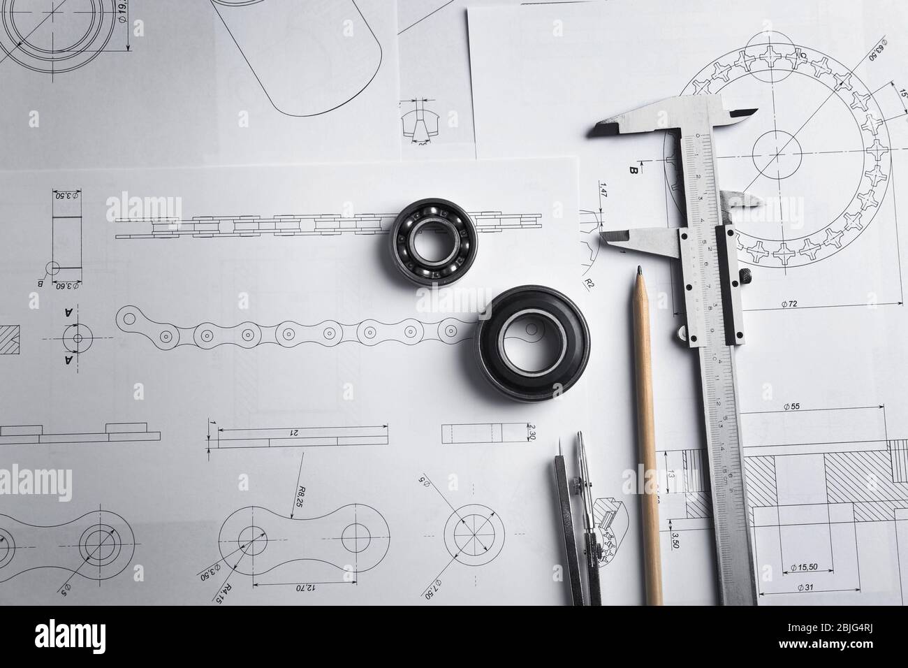 Engineering supplies and blueprints on workplace Stock Photo - Alamy