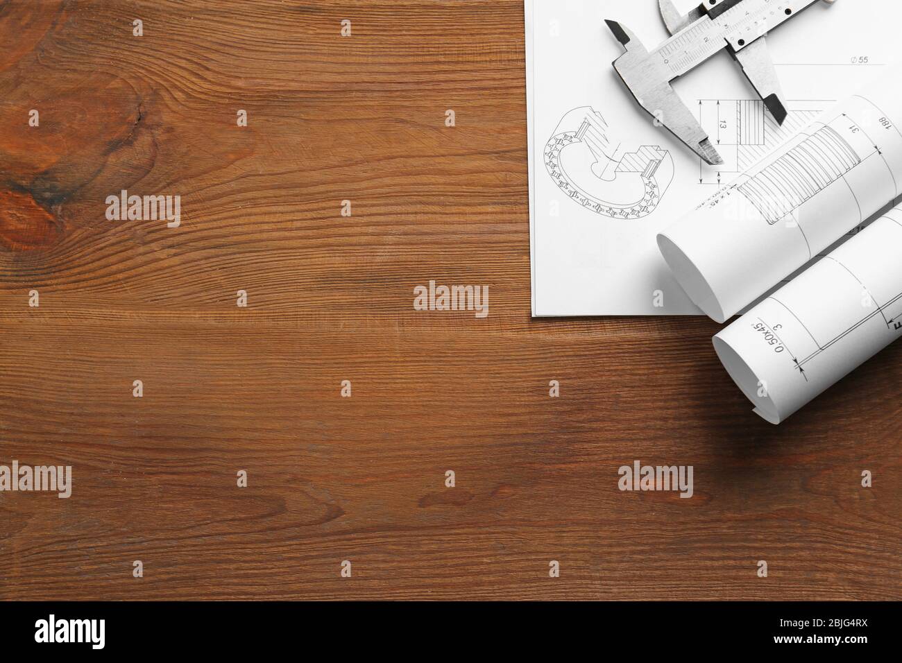 Engineering supplies and blueprints on workplace Stock Photo - Alamy