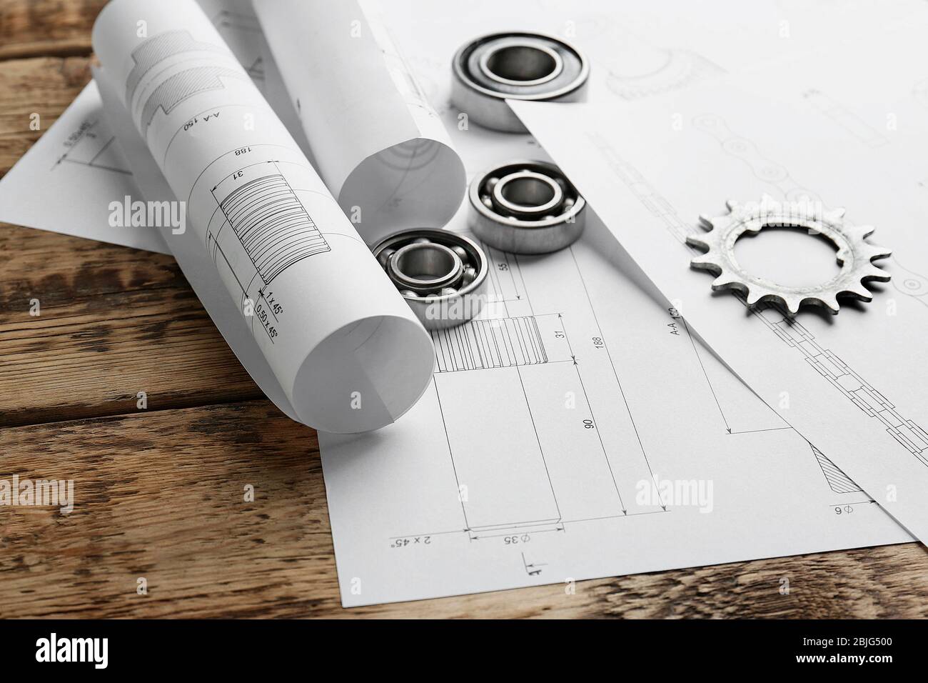 Engineering supplies and blueprints on workplace Stock Photo - Alamy