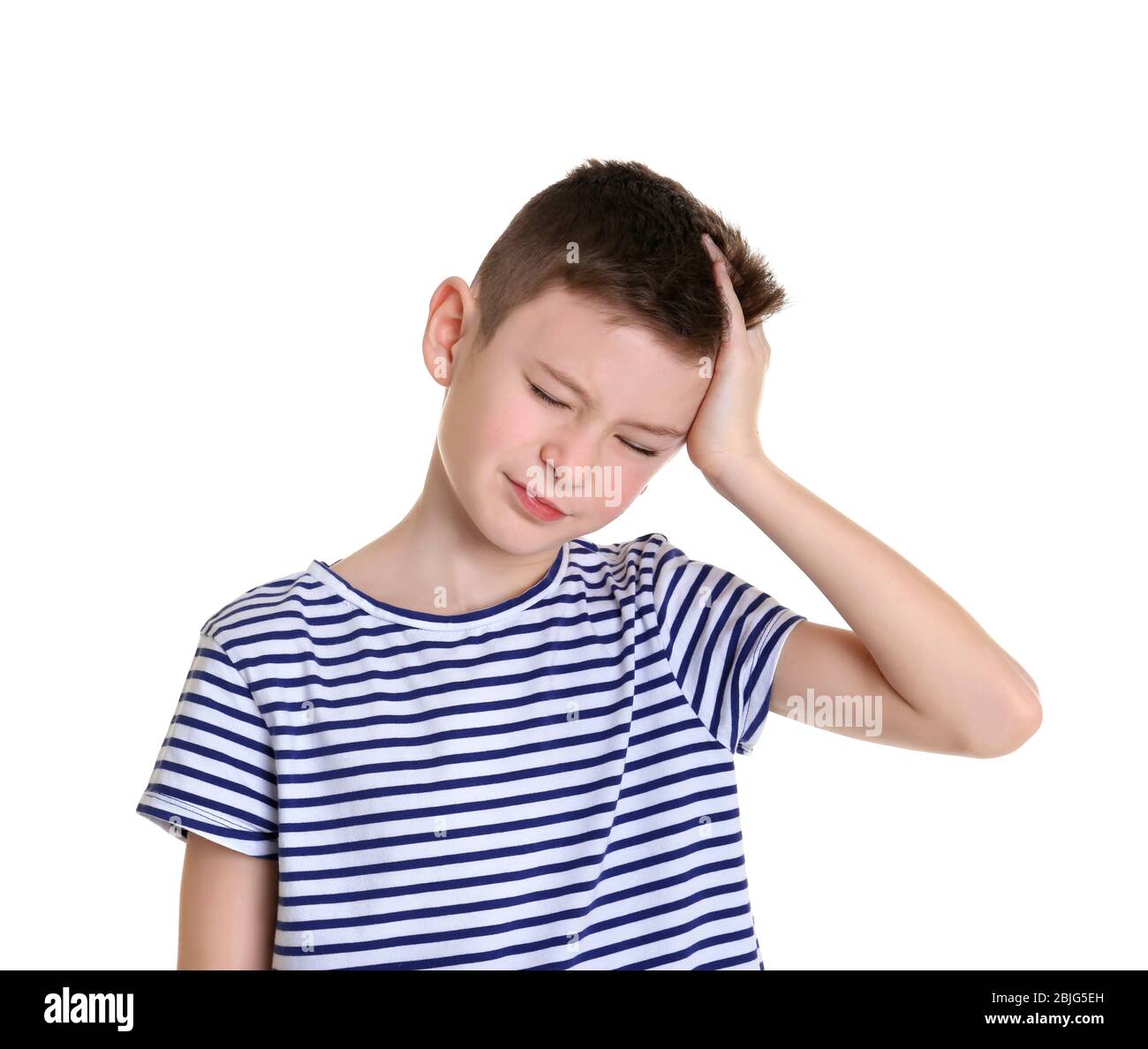 Cute boy suffering from headache on white background Stock Photo - Alamy