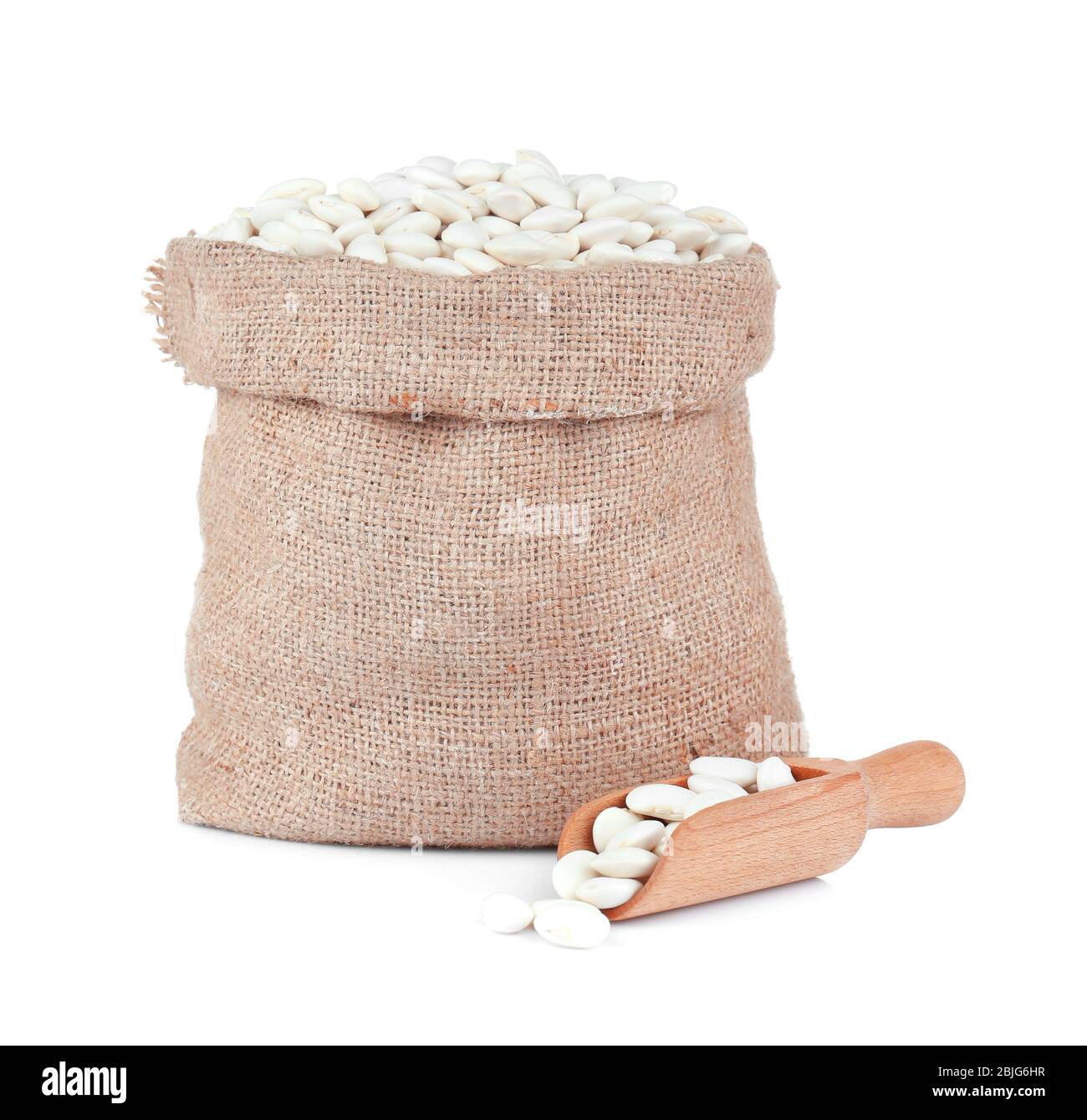 Butter beans in sack bag on white background Stock Photo - Alamy