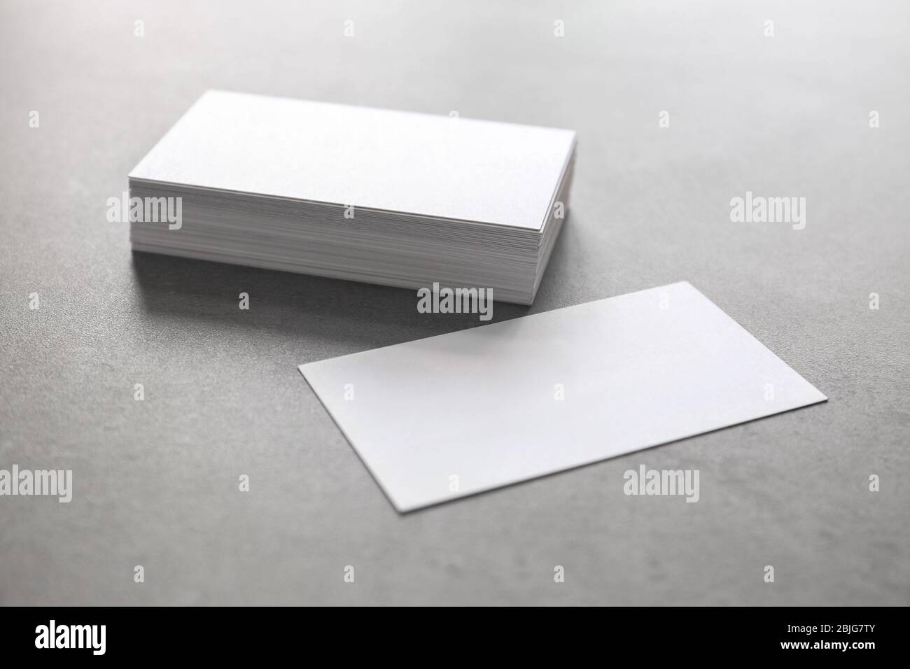 Set of blank items for branding on light background Stock Photo - Alamy