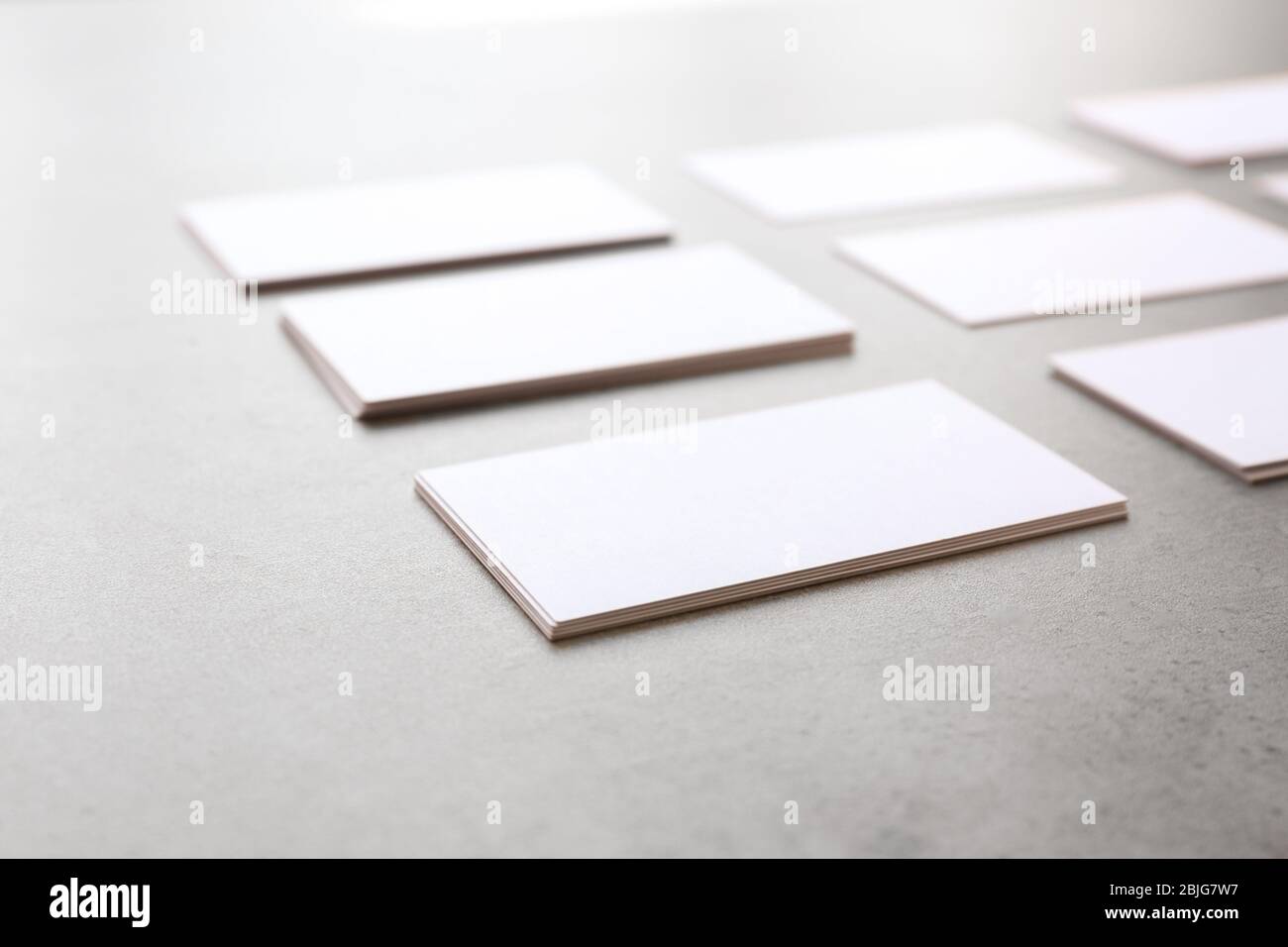 Set of blank items for branding on light background Stock Photo - Alamy