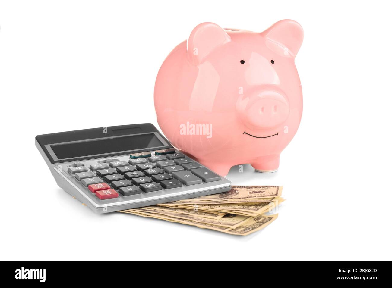 Piggy bank, banknotes and calculator on white background Stock Photo ...
