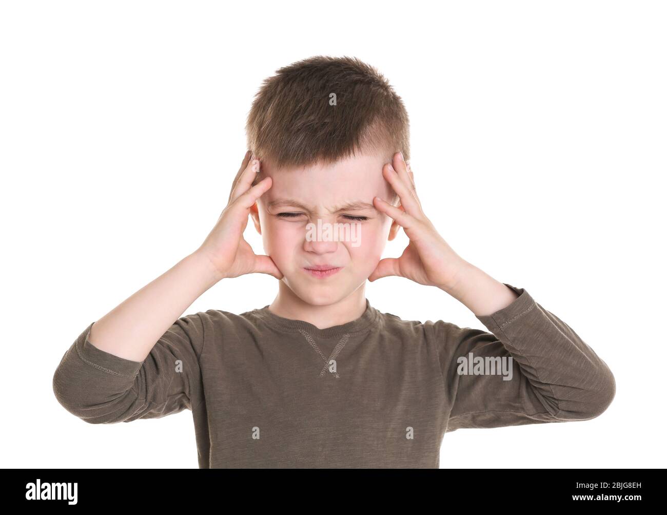 Little boy suffering from headache on white background Stock Photo - Alamy