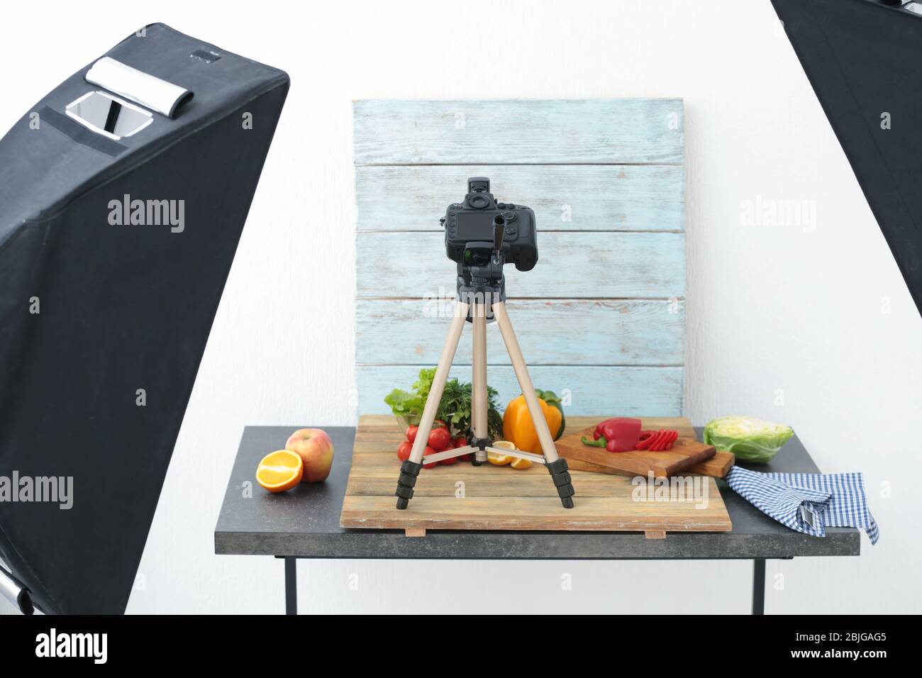Professional camera on tripod while shooting food Stock Photo - Alamy