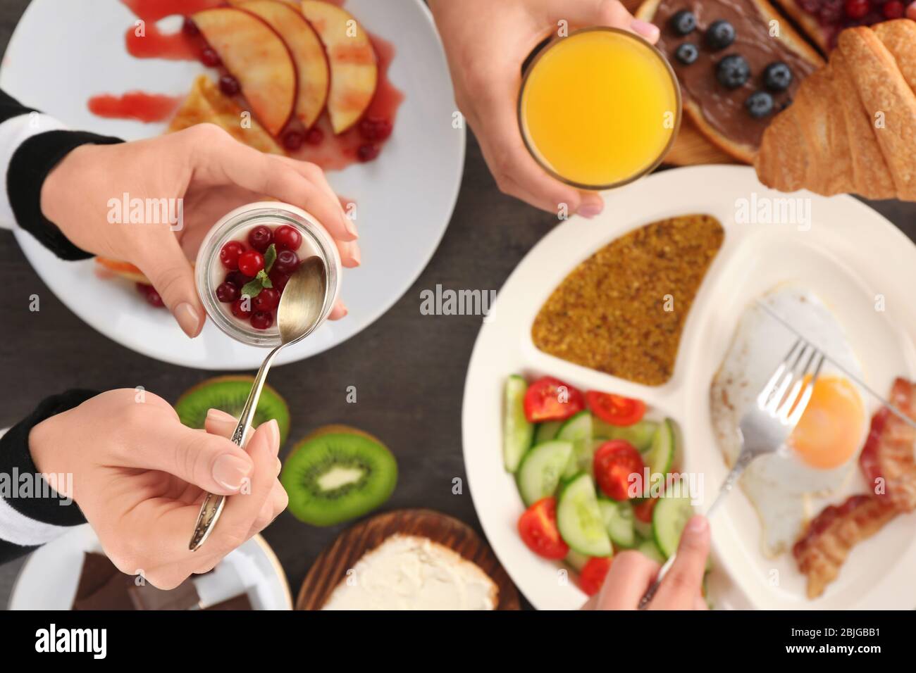 Breakfast family juice yogurt hi-res stock photography and images - Alamy