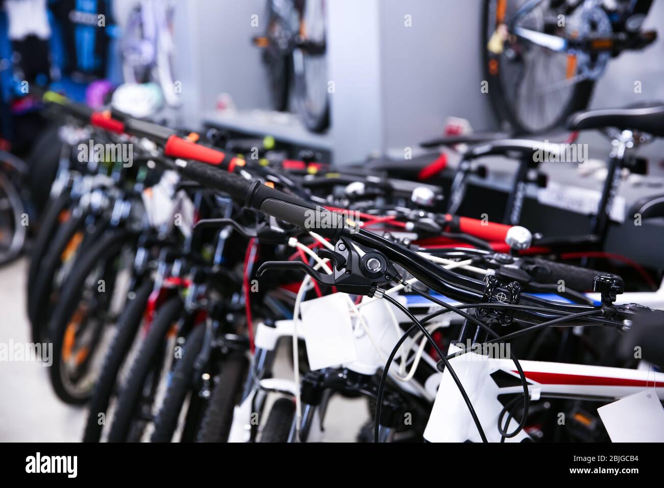 Modern new bicycles in shop Stock Photo - Alamy
