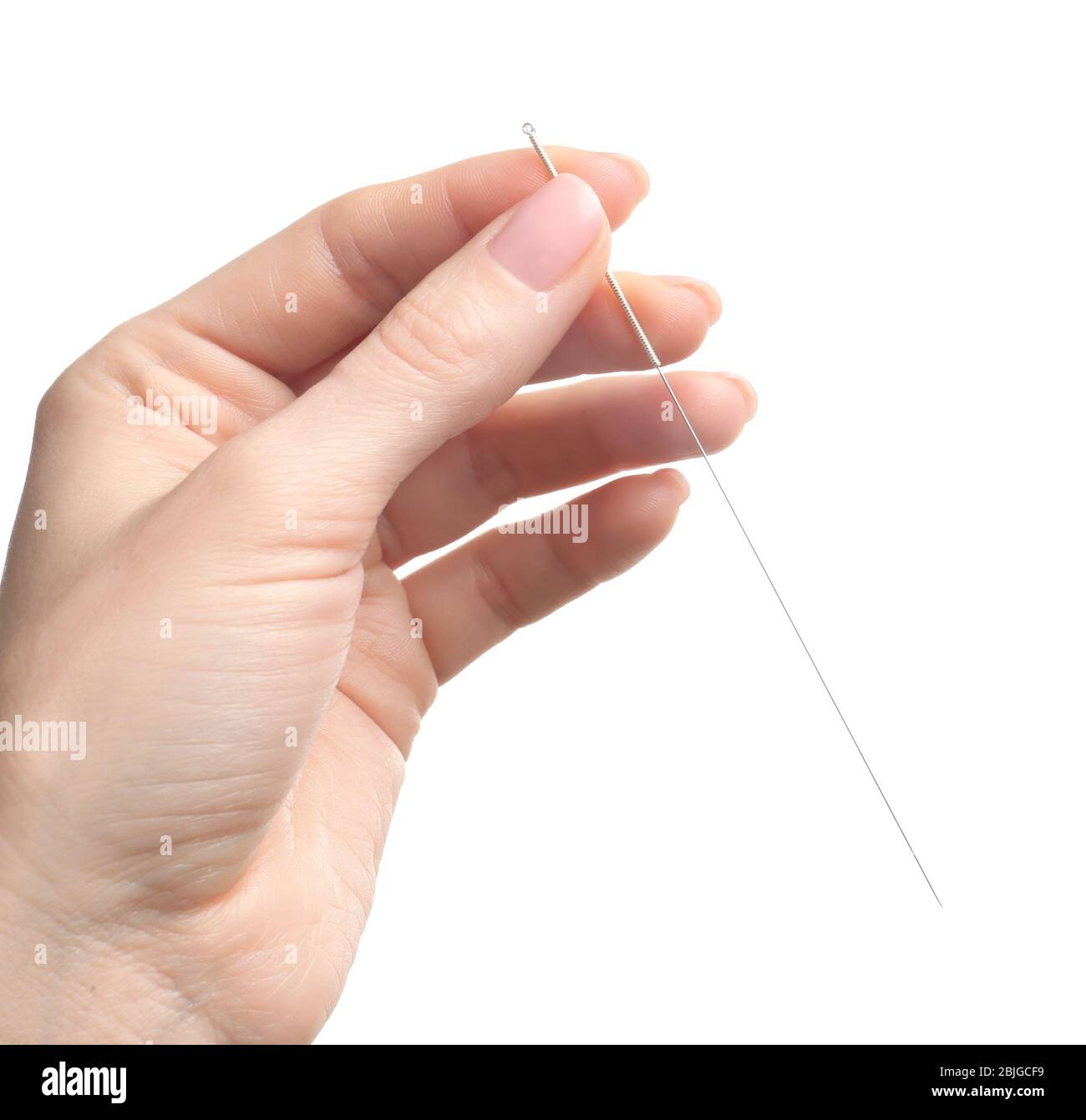 Female hand with needle for acupuncture on white background Stock Photo ...