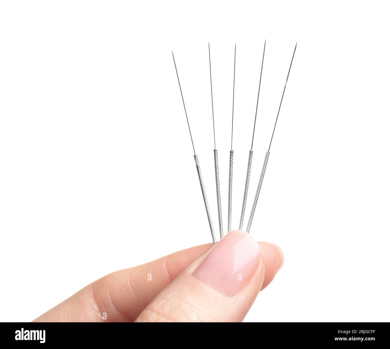 Female fingers with needles for acupuncture on white background Stock ...