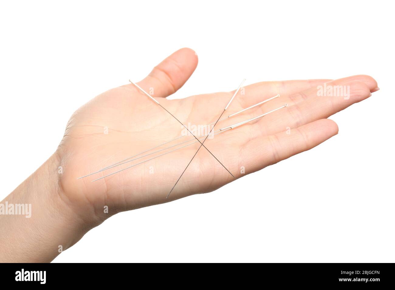 Female hand with needles for acupuncture on white background Stock ...