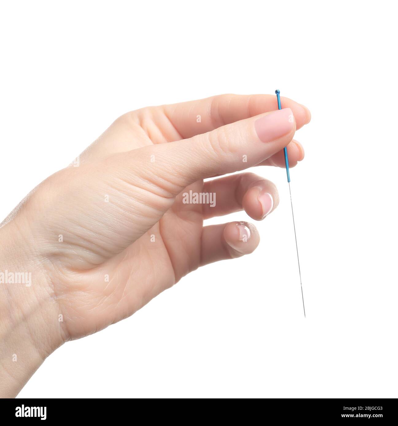 Female hand with needle for acupuncture on white background Stock Photo ...