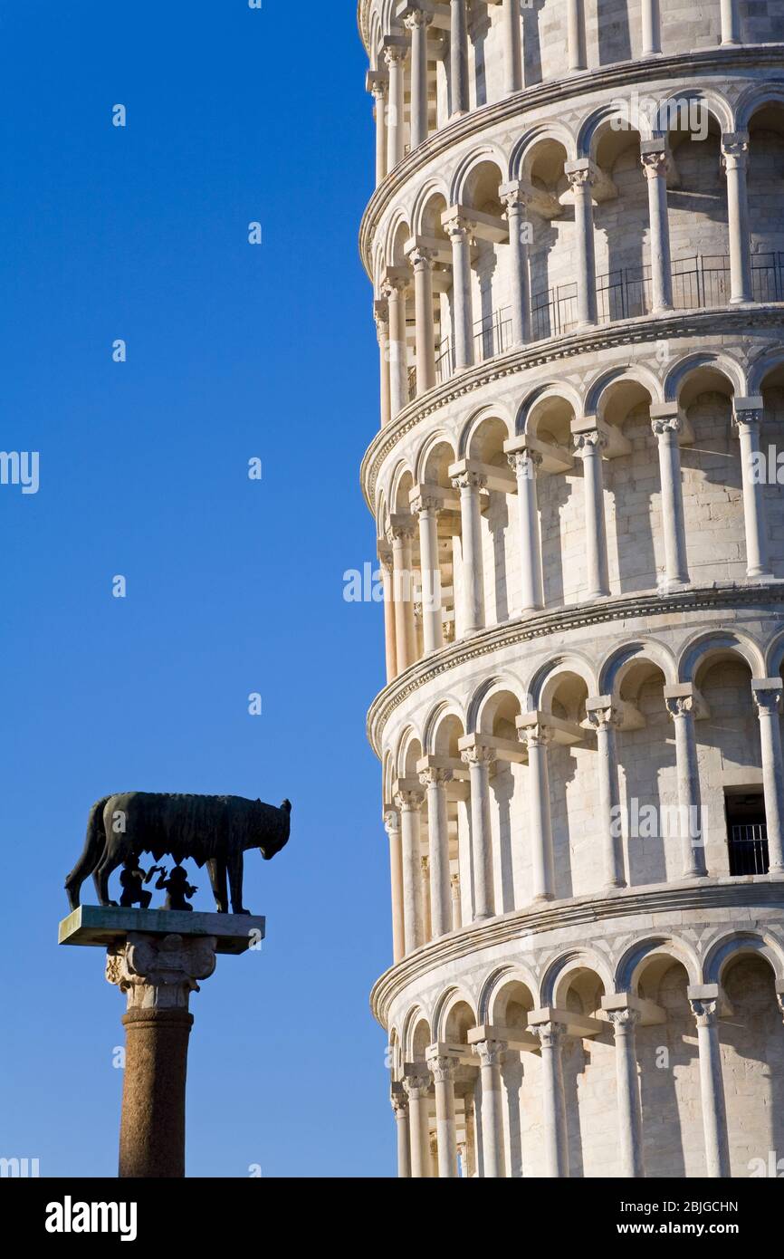 Leaning tower & statue of Romulus & Remus in Pisa, Tuscany, Italy ...