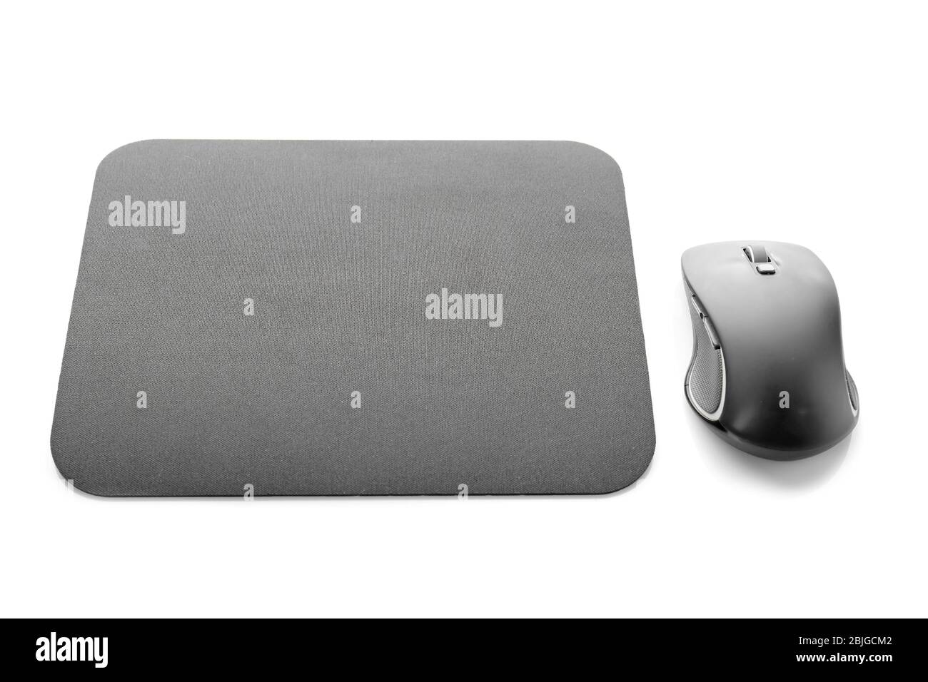 Modern wireless mouse and pad on white background Stock Photo - Alamy