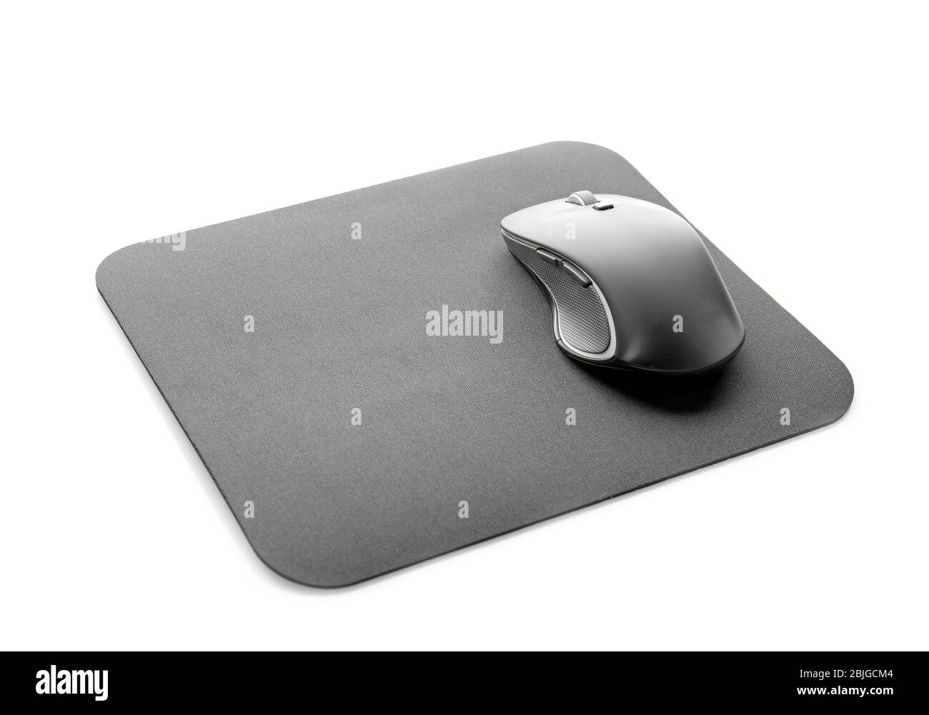 Modern wireless mouse and pad on white background Stock Photo - Alamy