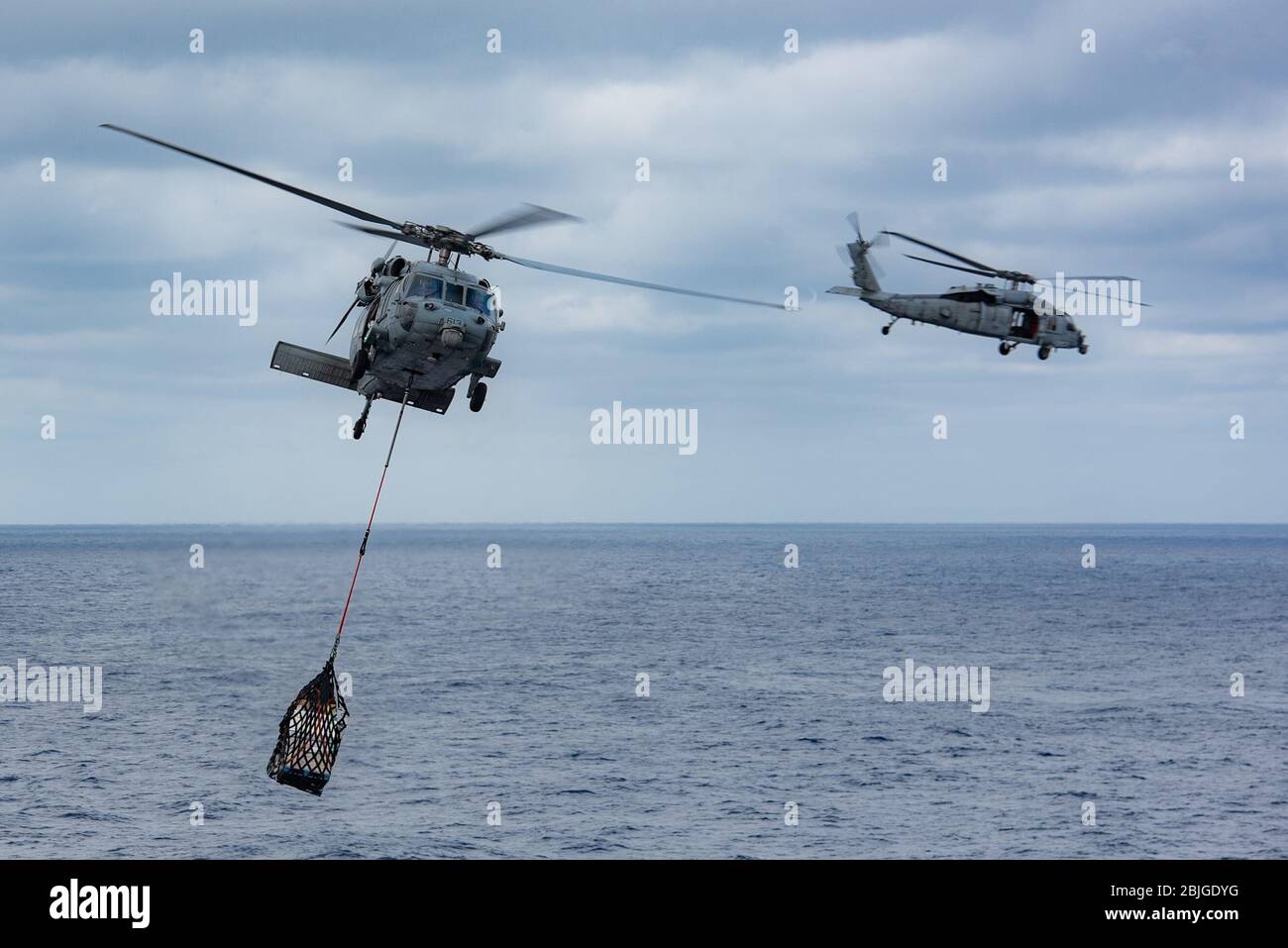 200425-N-WO152-0034 ATLANTIC OCEAN (April 25, 2020) Two MH-60S Sea Hawk ...