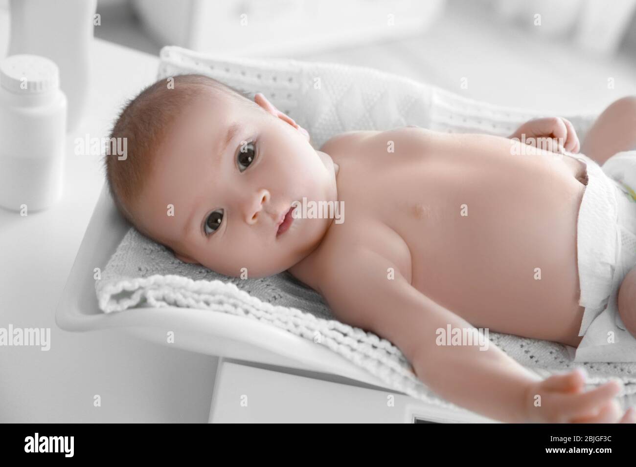 Child weighing scale clinic hi-res stock photography and images - Alamy
