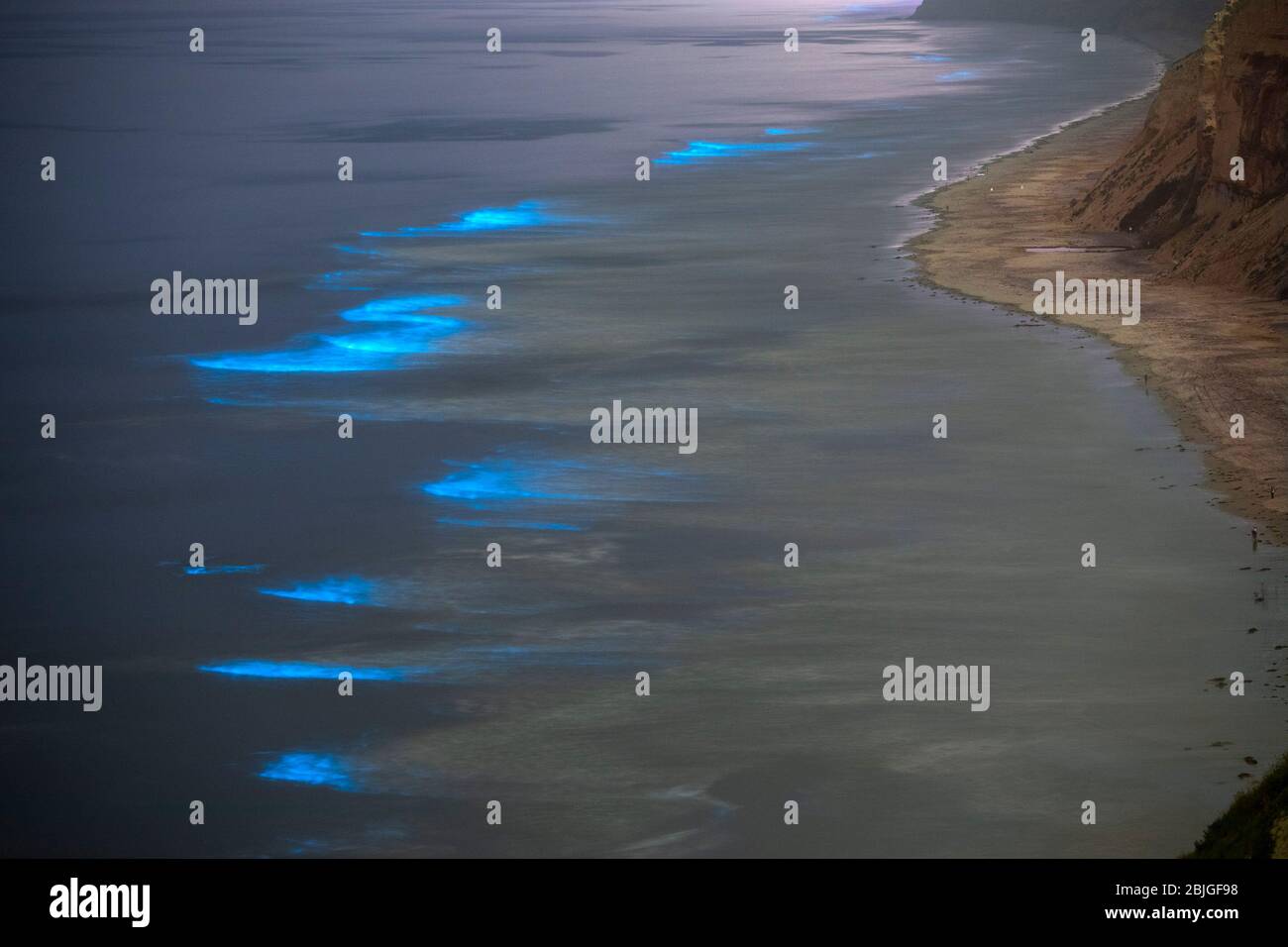 San Diego, California, USA. 28th Apr, 2020. Blue waves, illuminated by ...