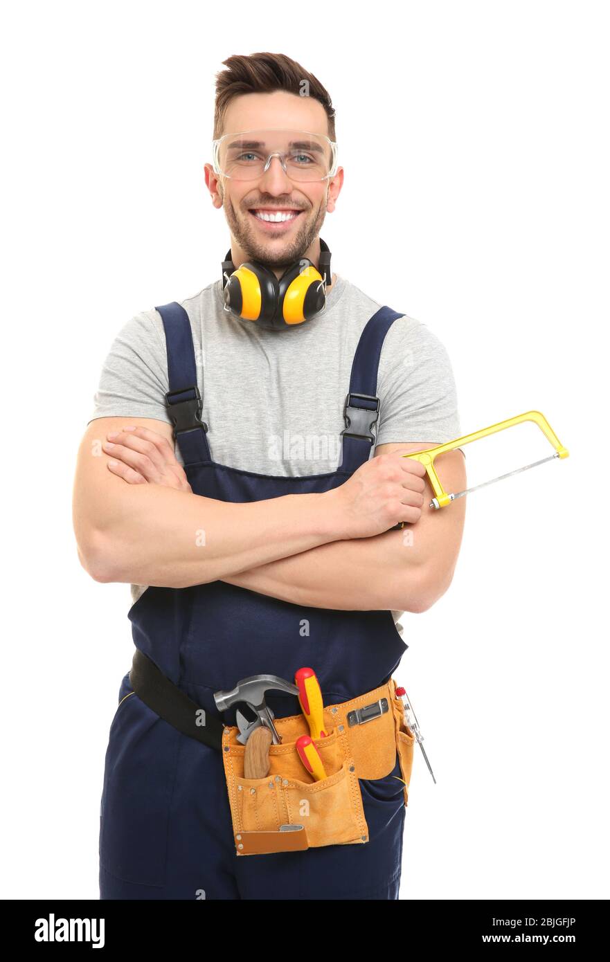Young carpenter wearing uniform on white background Stock Photo - Alamy