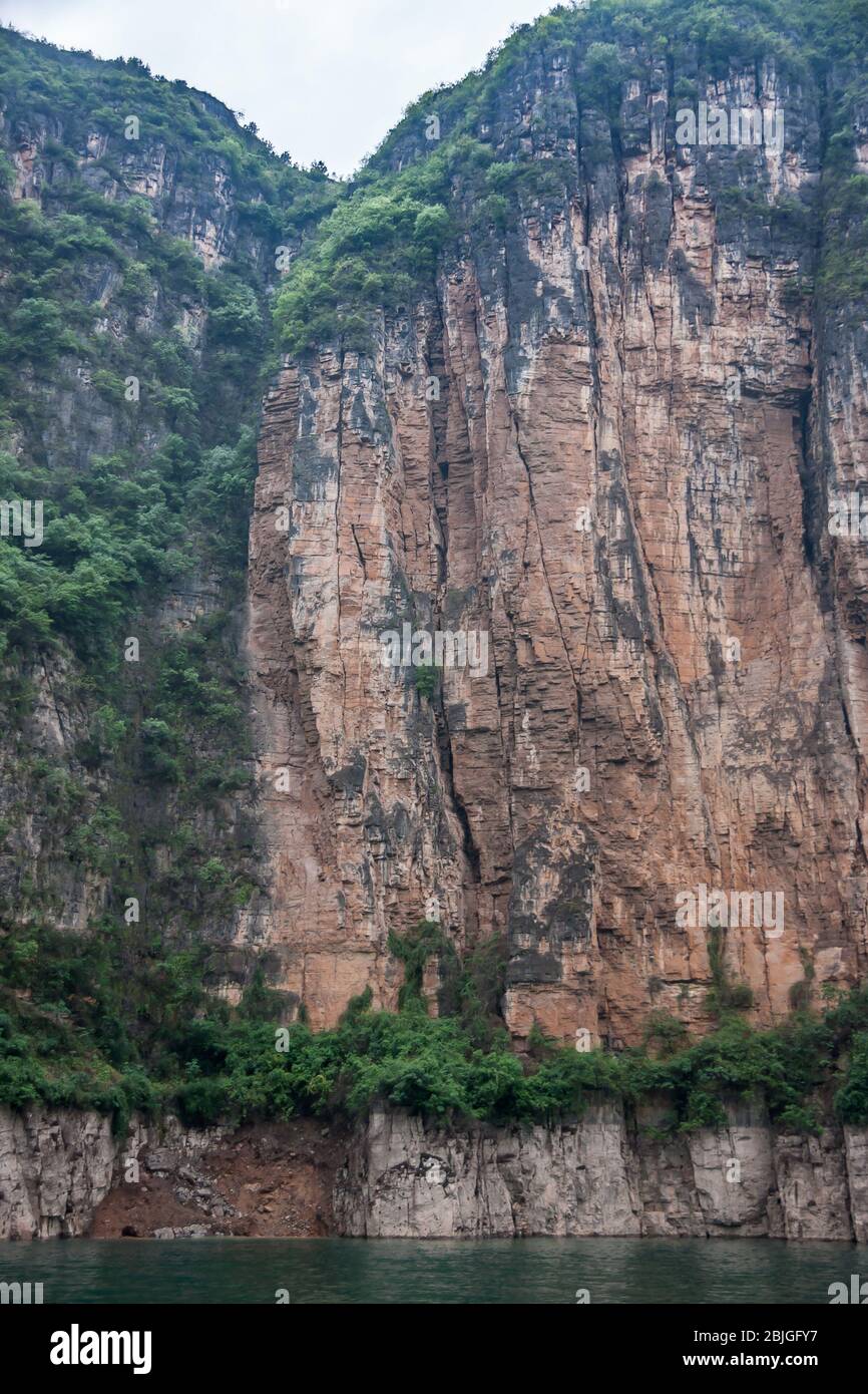 Wuchan, China - May 7, 2010: Dragon Gate Gorge on Daning River. Tall ...
